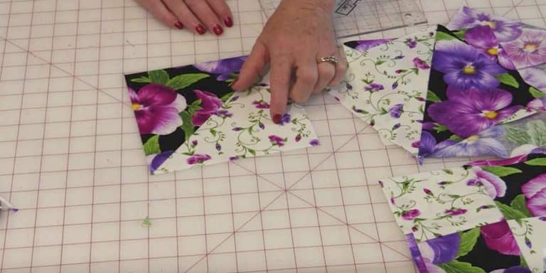 Simply Cut Squares And Long Strips To Make This Simple Pansy Quilt ...