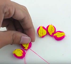 Make A Yarn Flower Using A Comb - DIY Joy