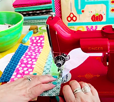 How To Make Easy Jelly Roll Strings Quilt Blocks - DIY Joy