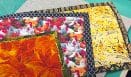 How To Make A Self-Binding Quilted Placemat - DIY Joy