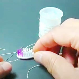 How To Thread A Needle Using A Toothbrush - DIY Joy