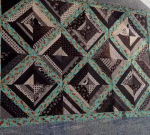 How to Make String Blocks Using Fabric Scraps - DIY Joy