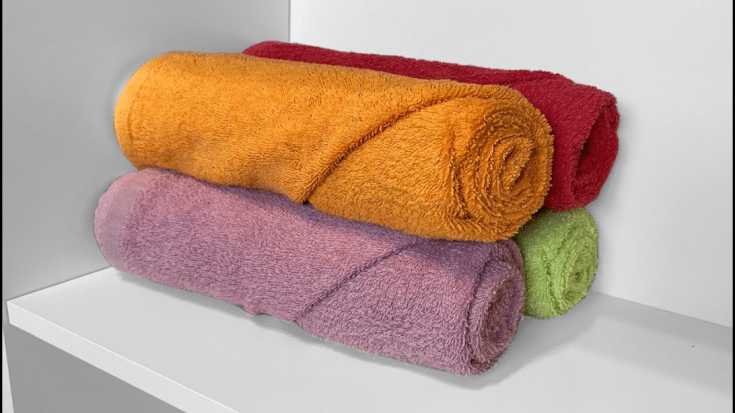 How to Roll Towels Like a Pro - DIY Joy