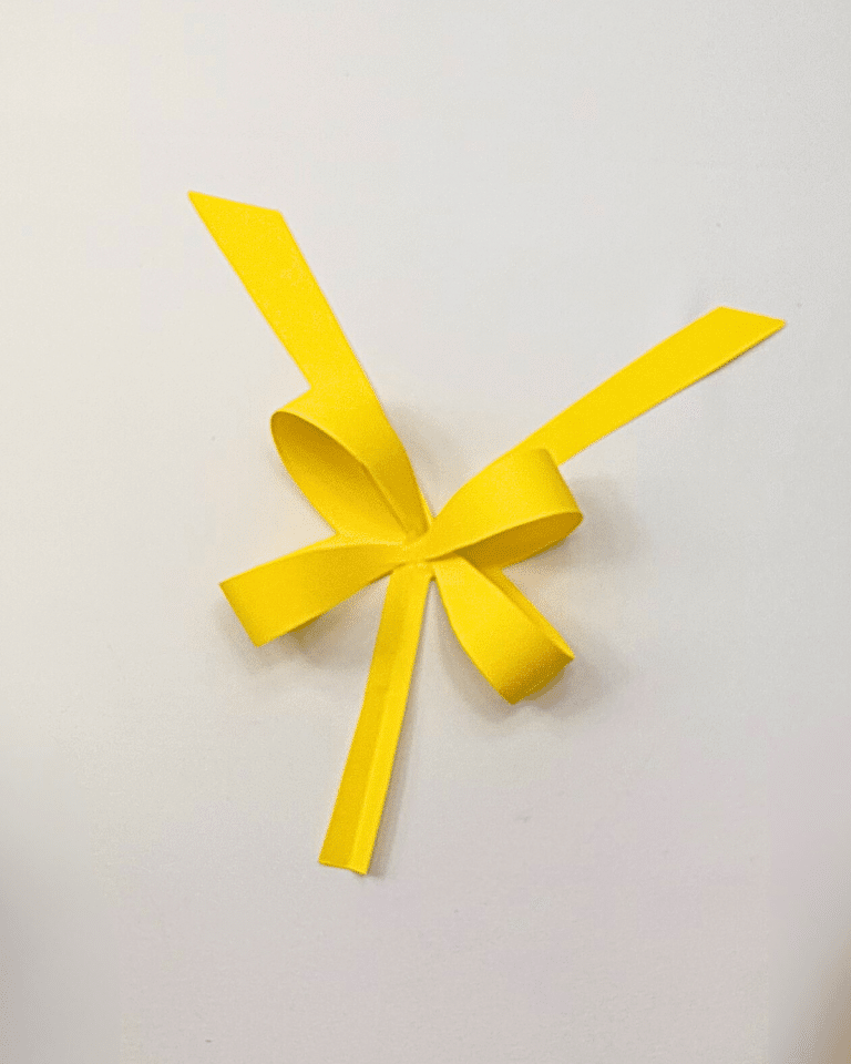 How to Make A Paper Bow | Step-by-Step Instructions - DIY Joy