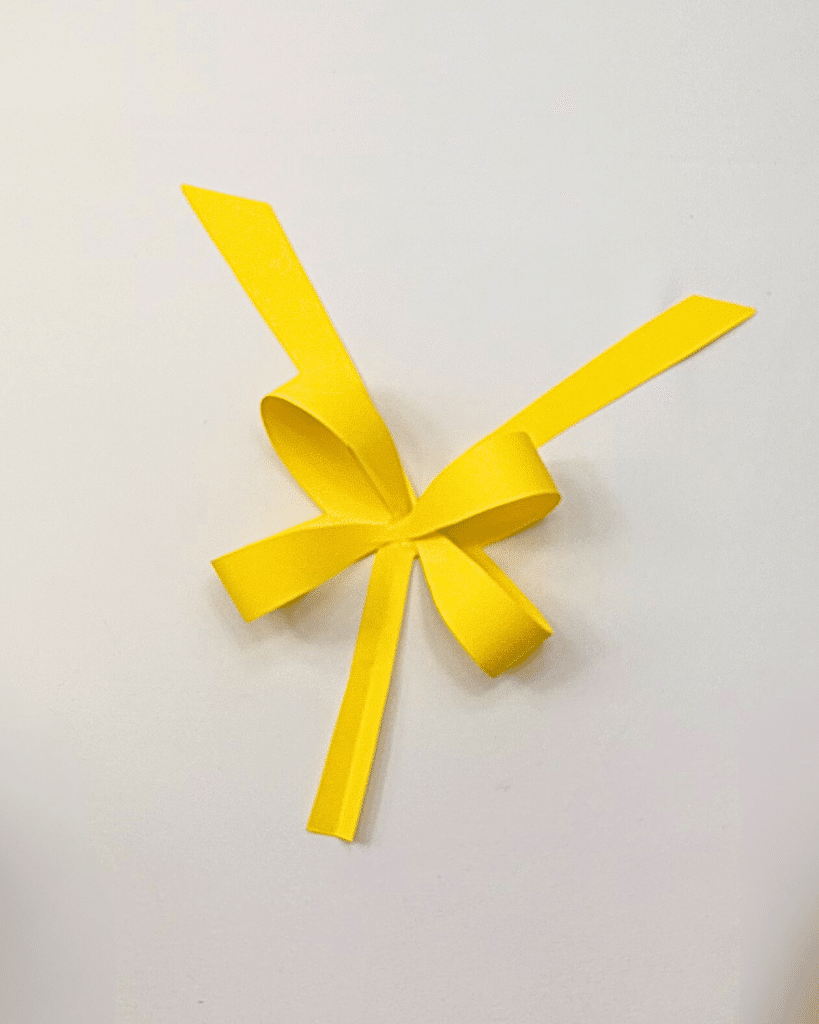 How to Make A Paper Bow | Step-by-Step Instructions - DIY Joy