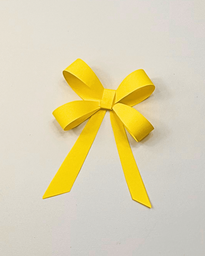 How to Make A Paper Bow | Step-by-Step Instructions - DIY Joy